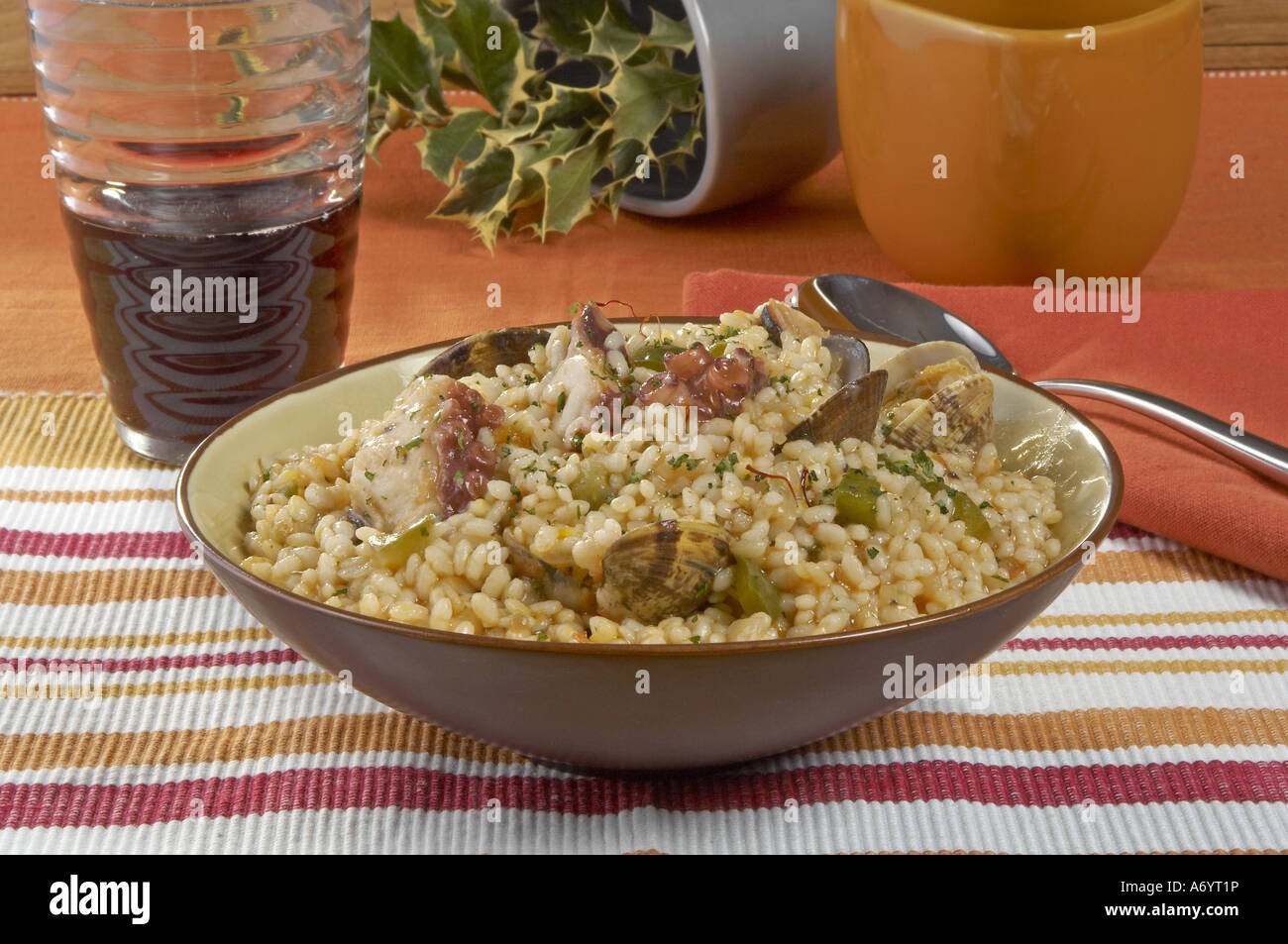 Rice with octopus and clams Stock Photo - Alamy