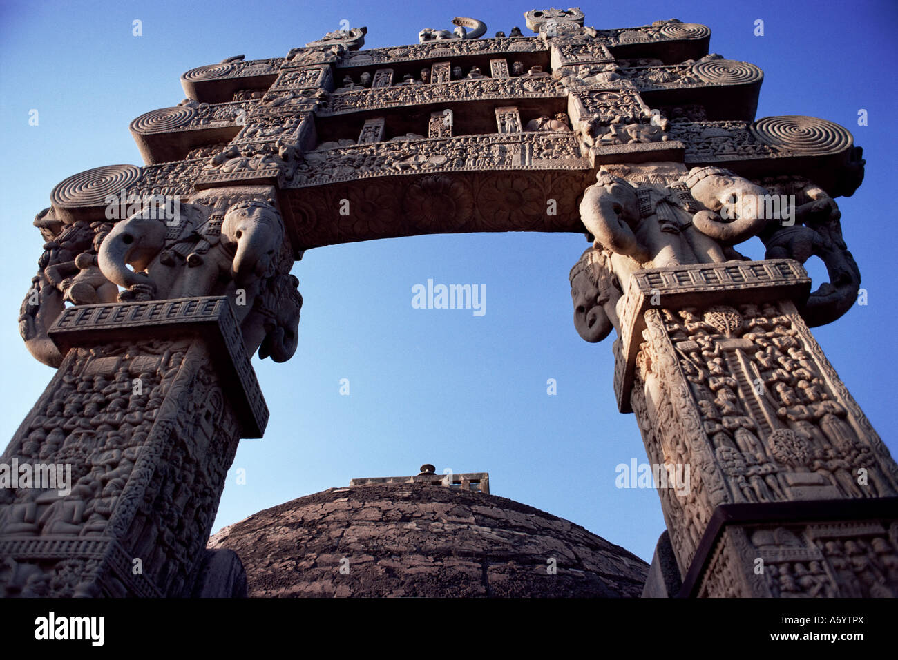 One of the four carved stone toranas gateways Stupa One Buddhist shrine ...