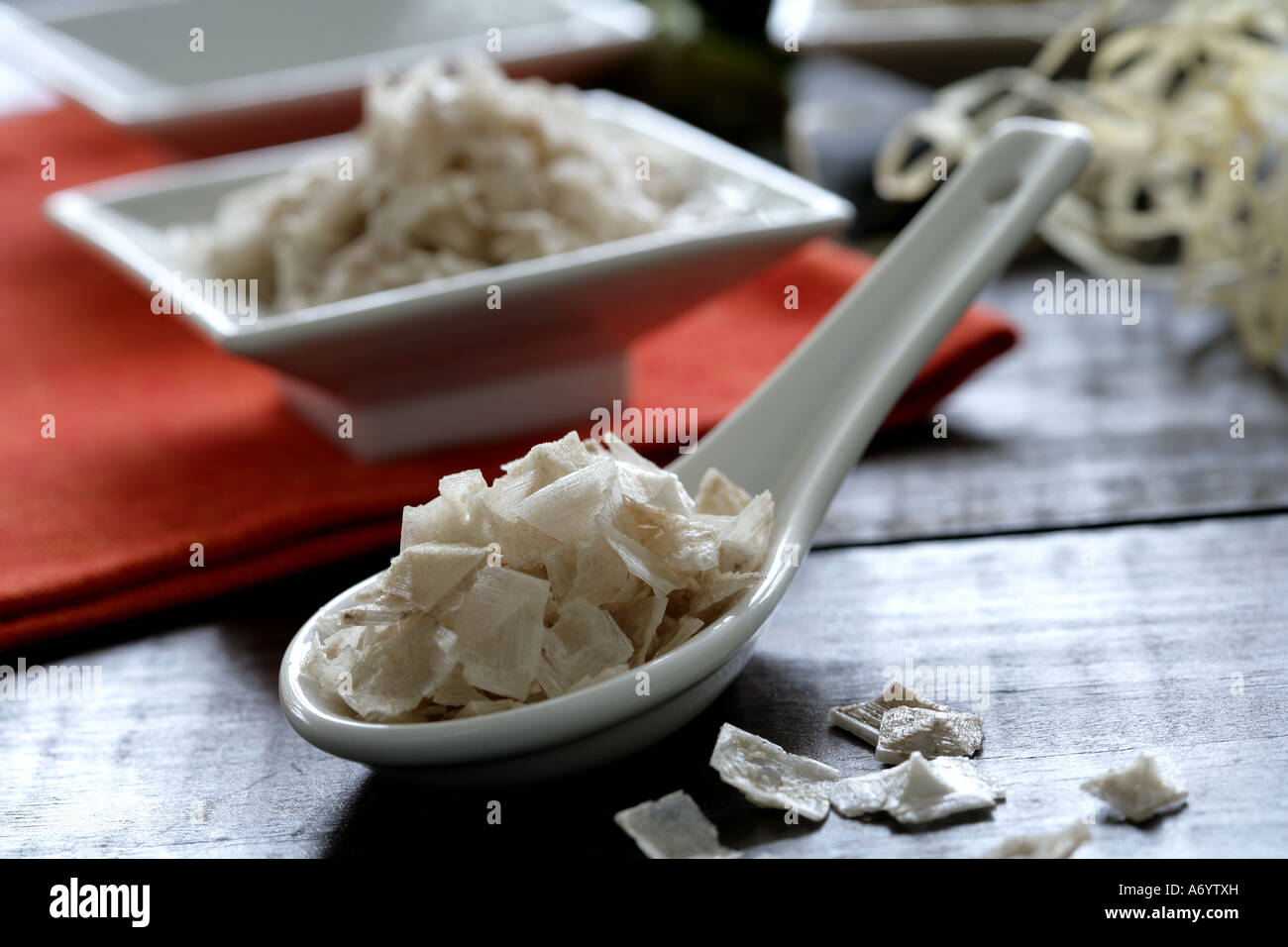 Smoked crystal salt on different plates Stock Photo - Alamy