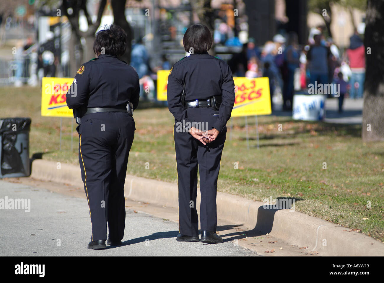 Two police women walking hi-res stock photography and images - Alamy