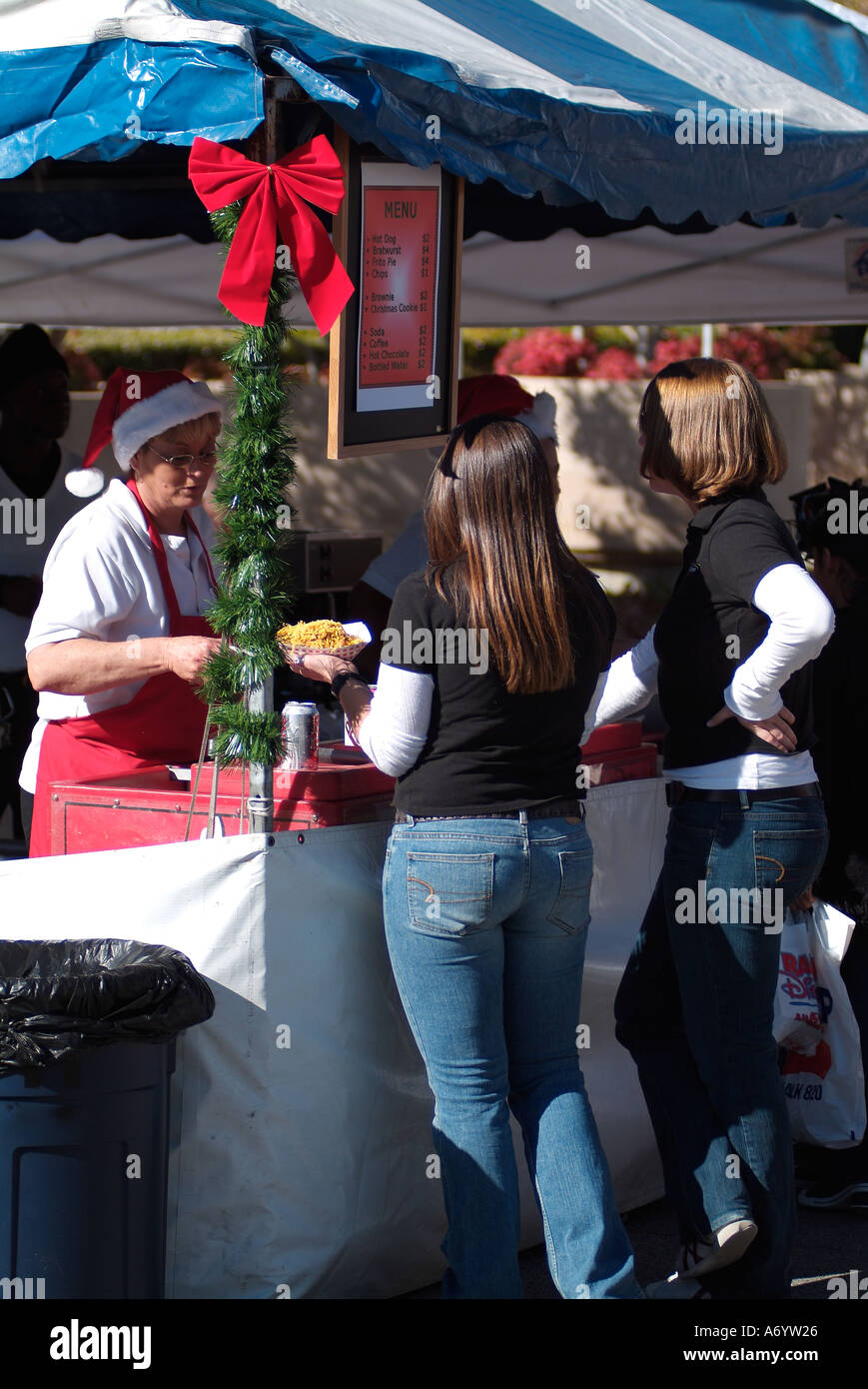 Group of young girls shopping at a junk food store Stock Photo - Alamy