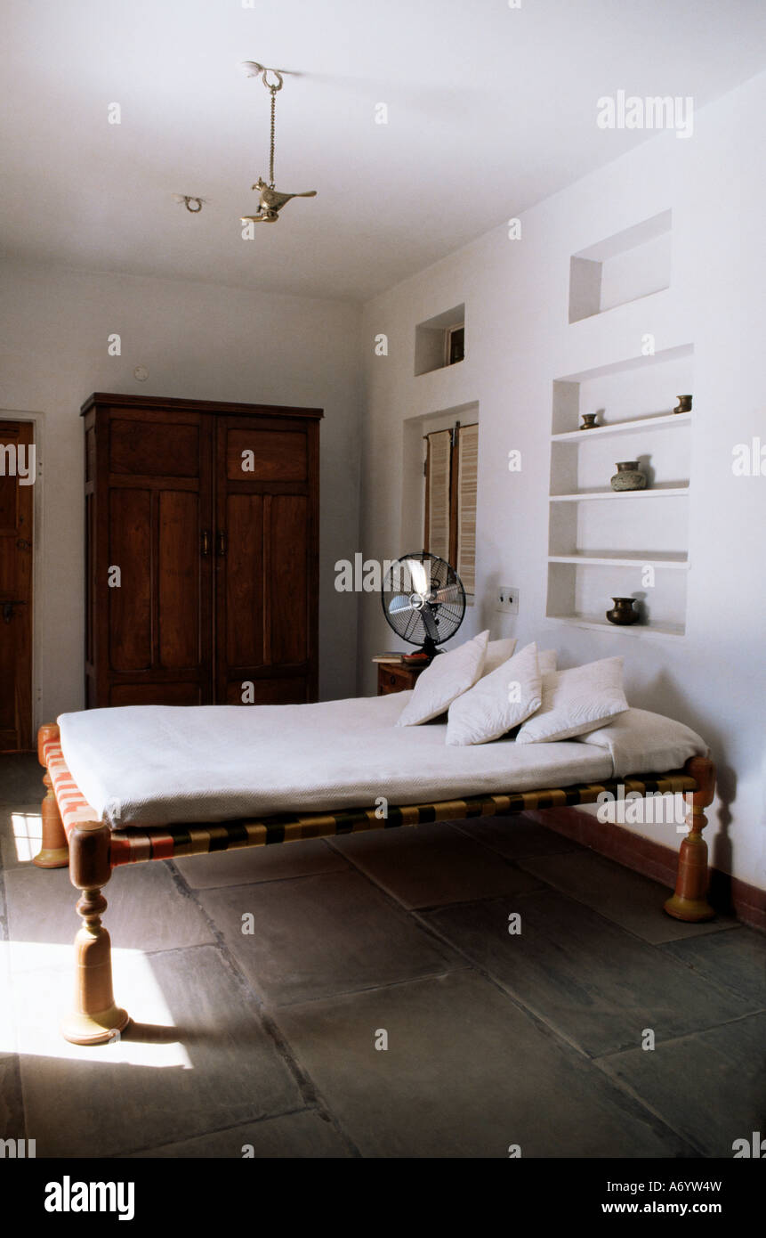 Bedroom with traditional low slung bed or charpoy in a home in Amber ...