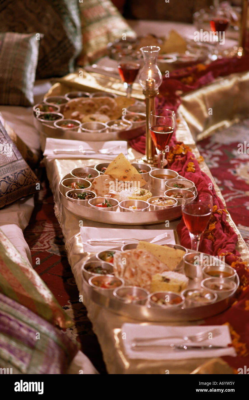 Traditional Rajasthani food served in traditional brass thalis in the ...