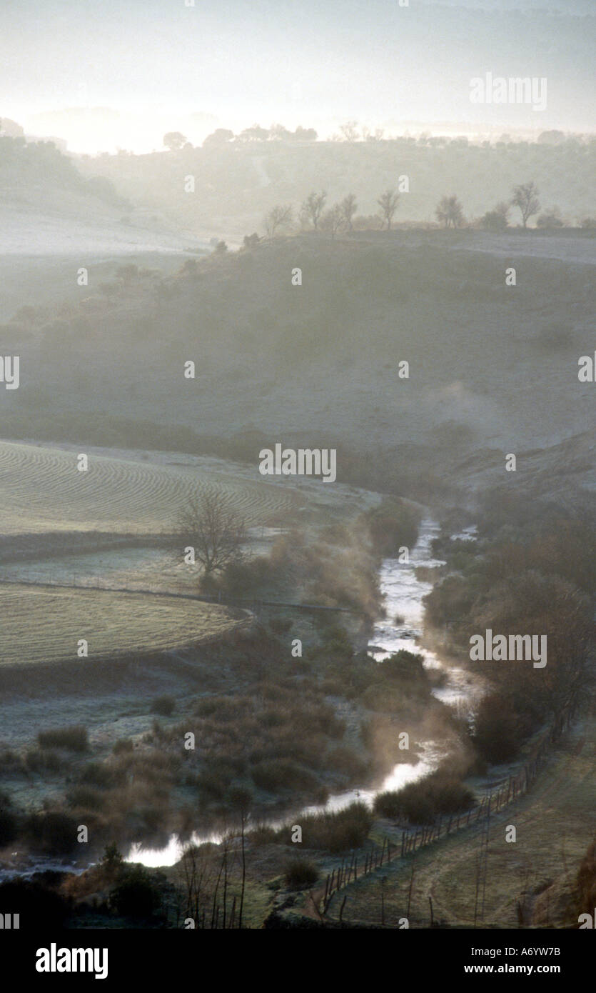 Dawn mist rising from an Andalusian valley Stock Photo - Alamy