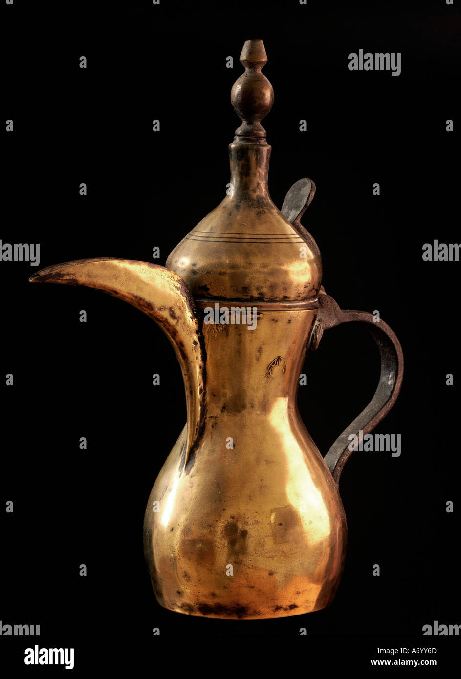 Arabic coffee pot on a black background Stock Photo - Alamy