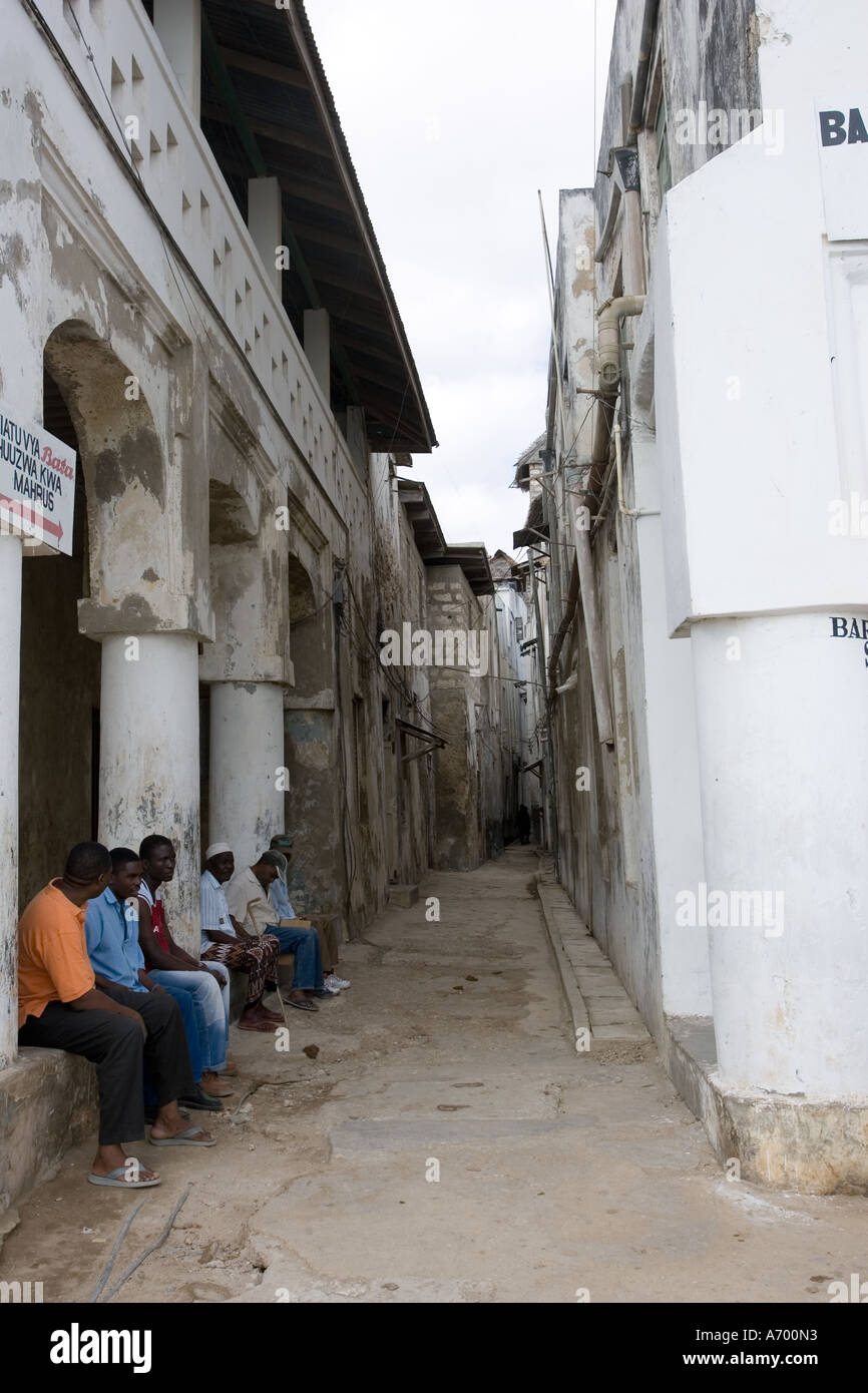 Old buildings either side of narrow street Lamu Island Kenya East ...
