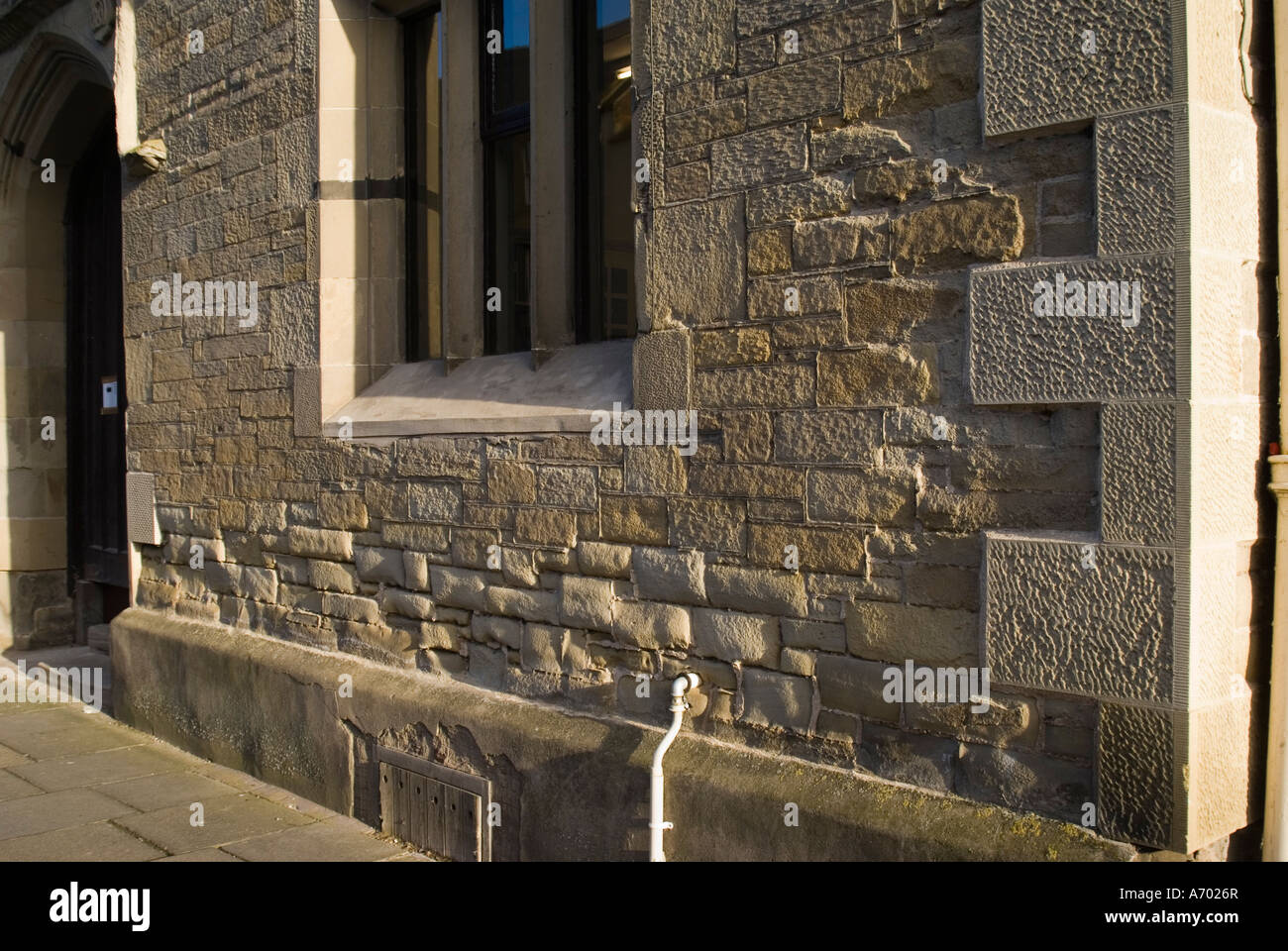 Repairs to 200 year old sandstone in Kelso town centre Scotland showing ...