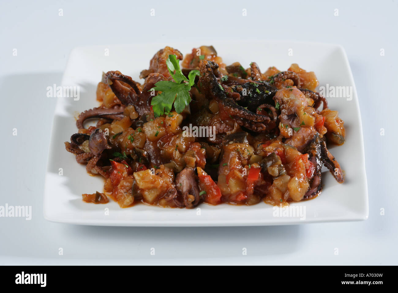 Mini octopuses with ratatouille Stock Photo - Alamy