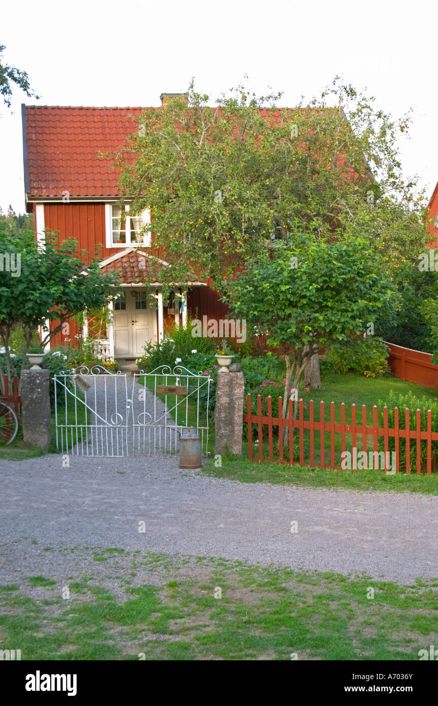 The red houses on the road in Bullerbyn Mellangården, The Middle House ...