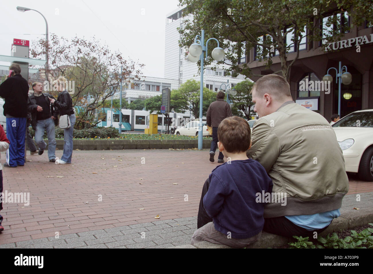 Mannheim, DEU, 12.12.2004, young homeless man with child in Mannheim ...