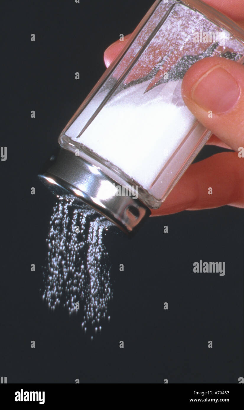 food spice salt hand with a saltshaker Stock Photo - Alamy