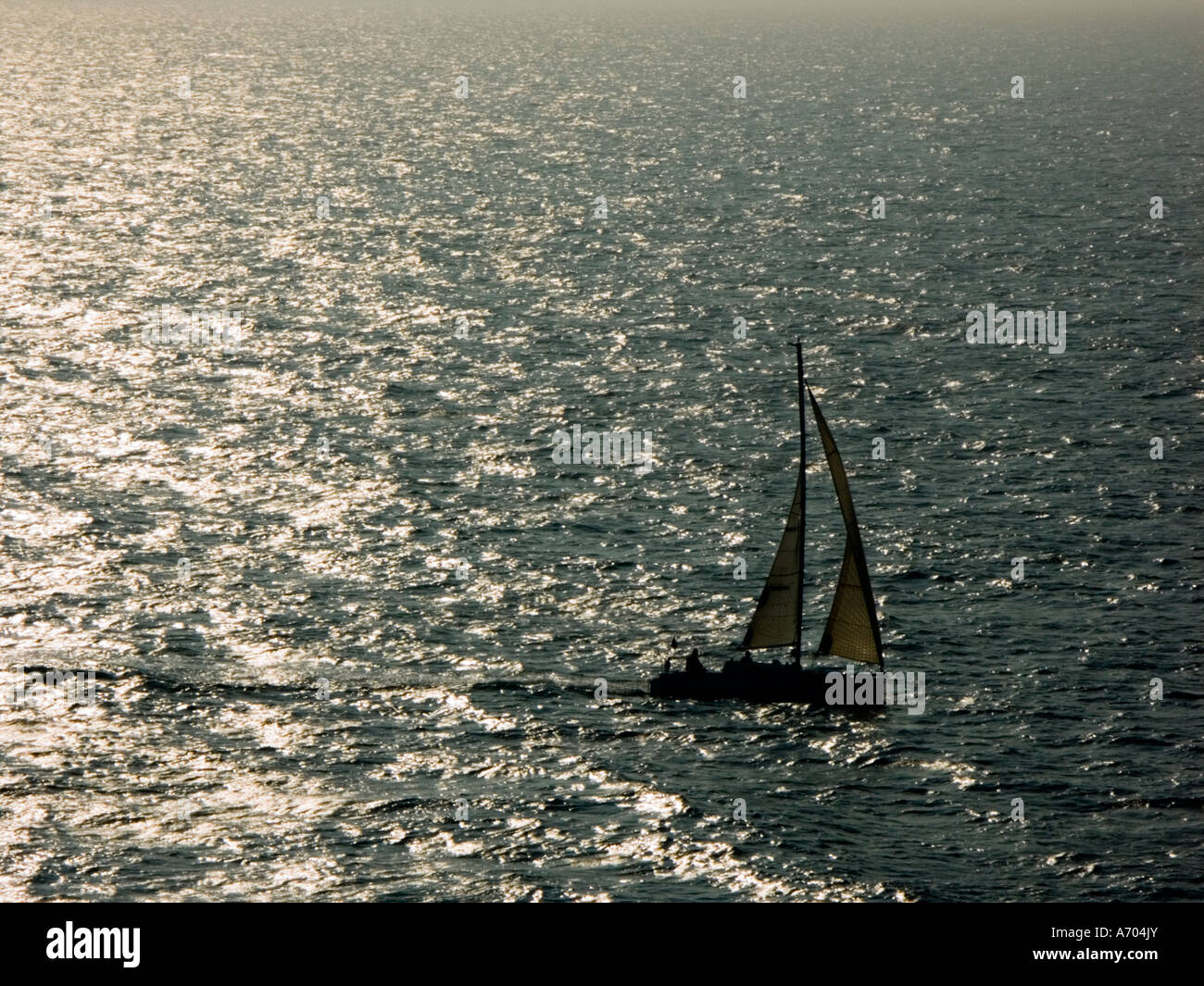 Yacht on open sea Channel Isles Stock Photo - Alamy