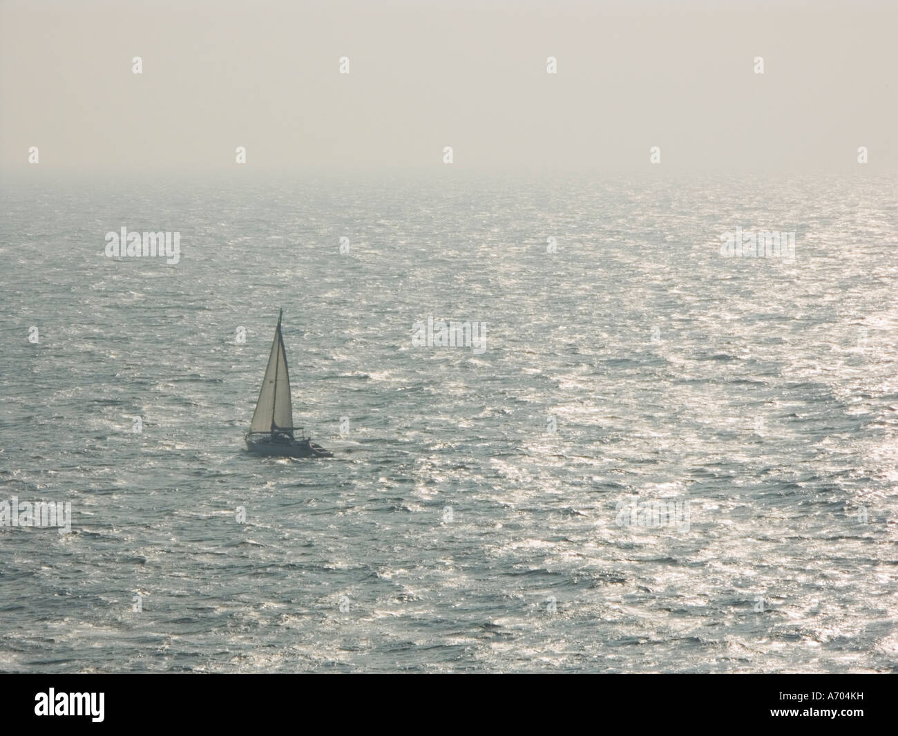 Yacht on open sea Channel Isles Stock Photo - Alamy