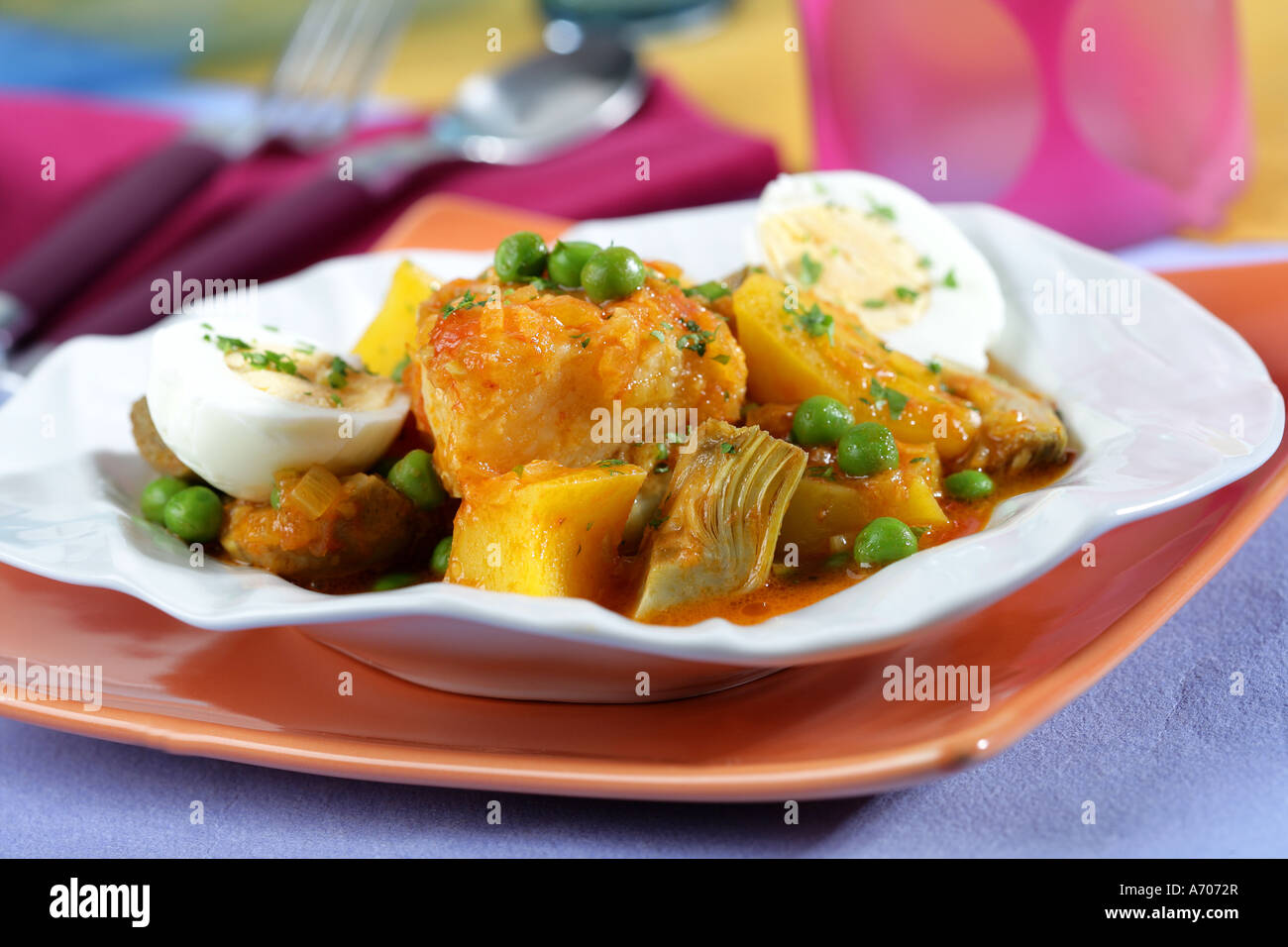 Catalan style cod with egg Stock Photo - Alamy