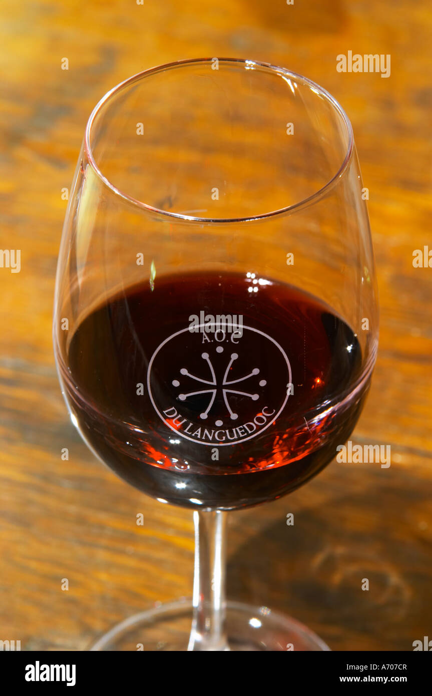 Glass embossed marked with AOC Languedoc and the Languedocian Cathar ...