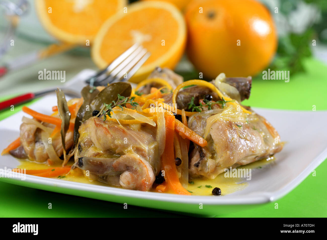 Rabbit pickled in orange marinade Stock Photo - Alamy