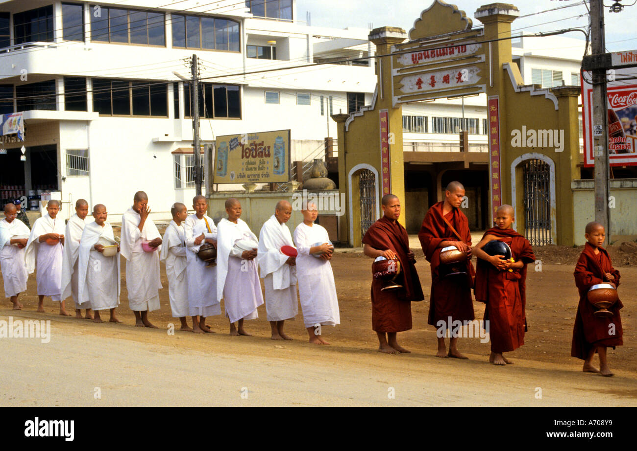 Thailand Thai Buddhist monk religion temple Monks eating meal rice food ...