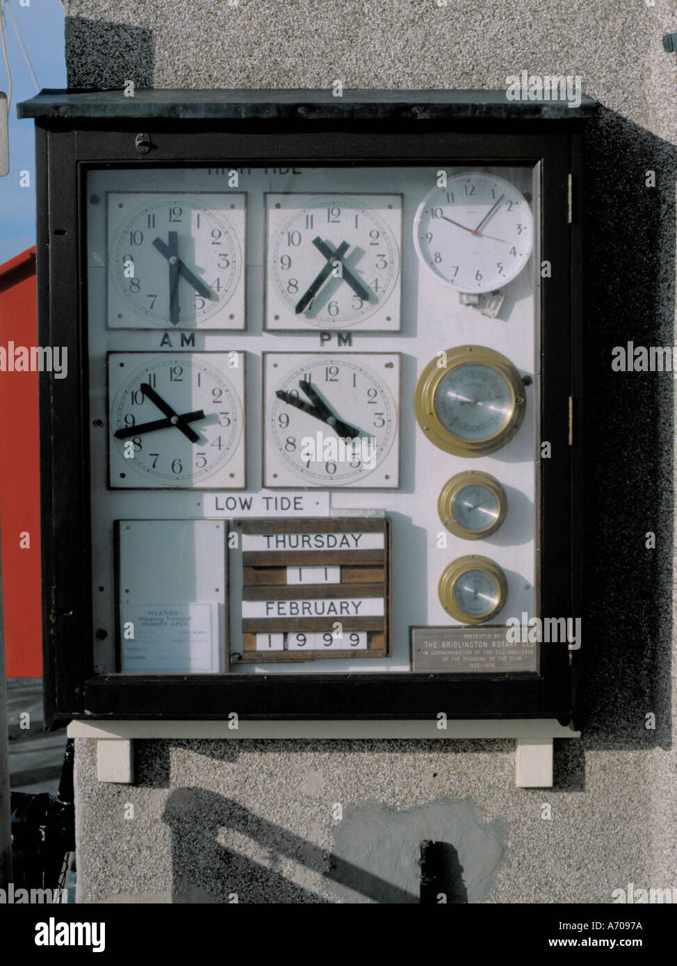 Tide clocks at a harbour master's office, England, UK Stock Photo - Alamy