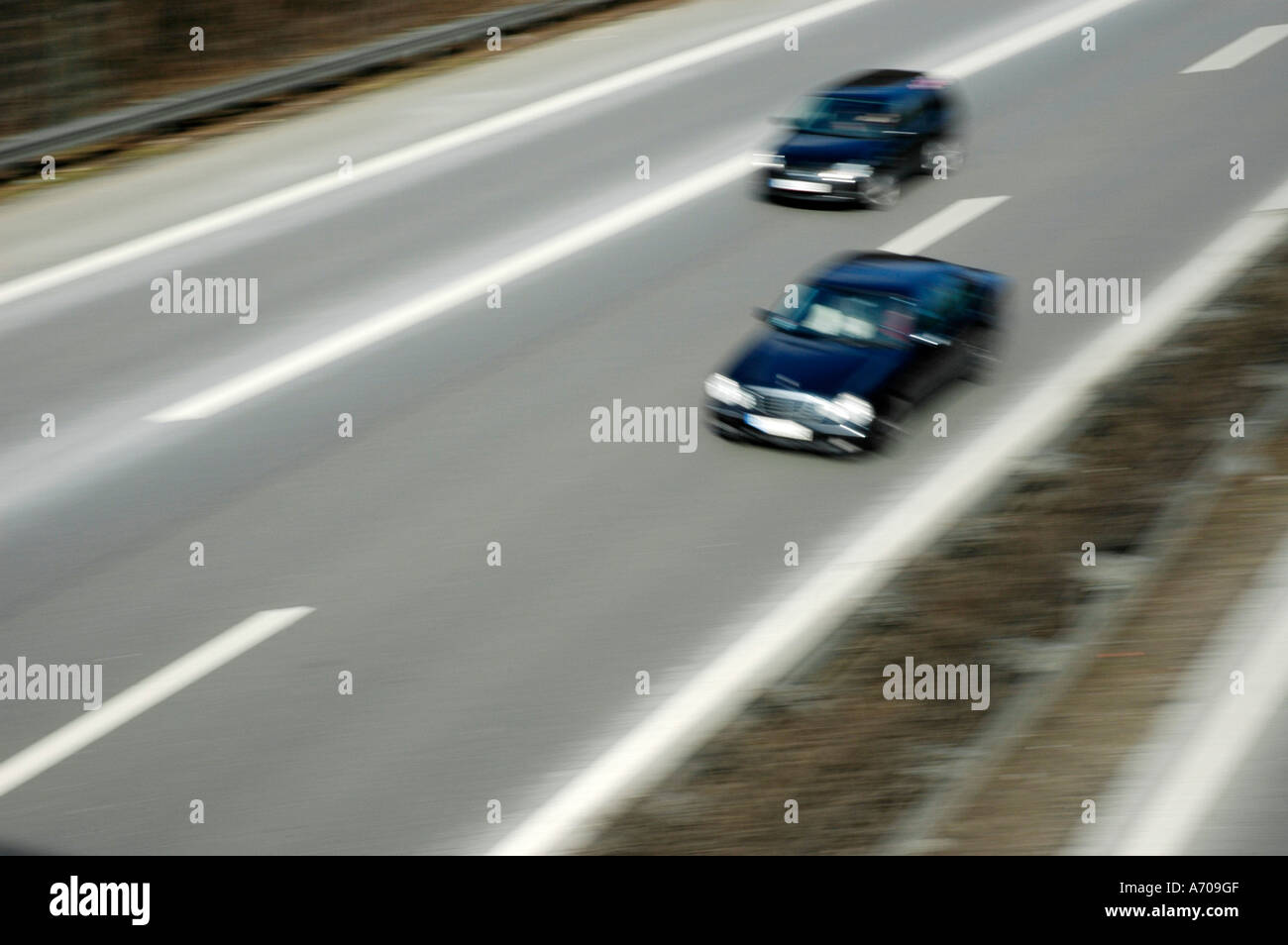 Fast driving cars on the autobahn, speed, traffic Stock Photo - Alamy