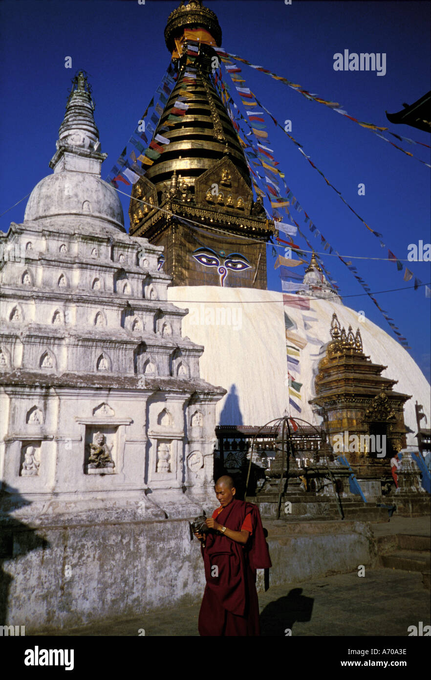 Monkey temple and monk Stock Photo - Alamy