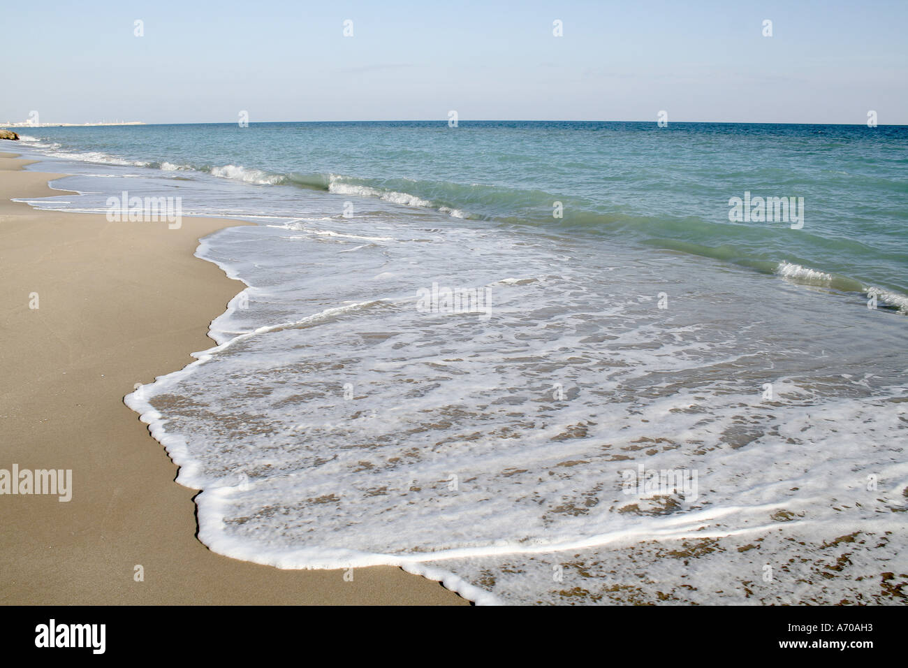 Deserted lonely beach in the early season El Vendrell, Coma Ruga Costa ...