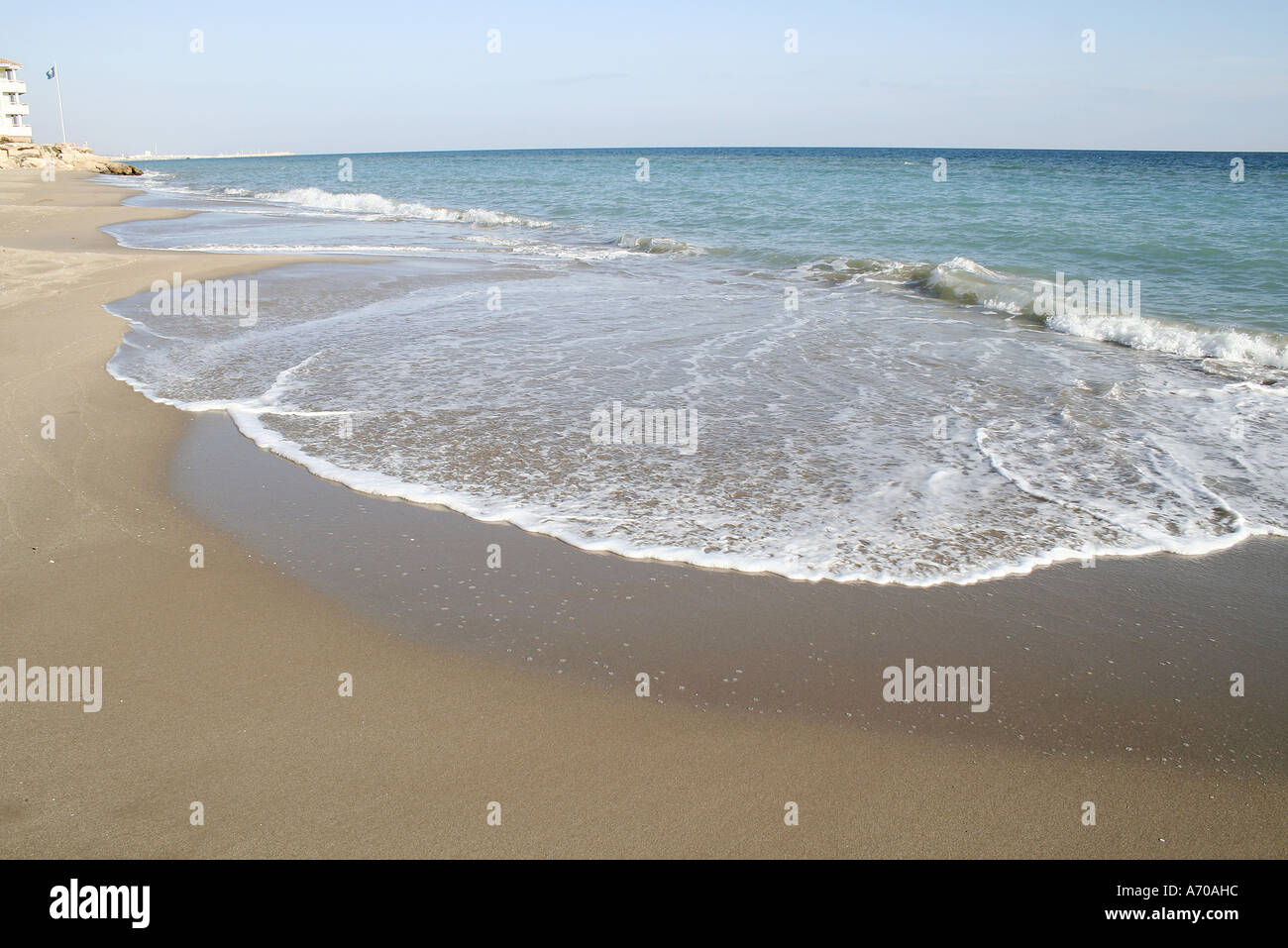 Deserted lonely beach in the early season El Vendrell, Coma Ruga Costa ...