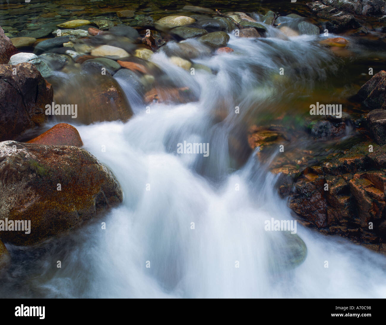 Water flowing over rocks Stock Photo - Alamy