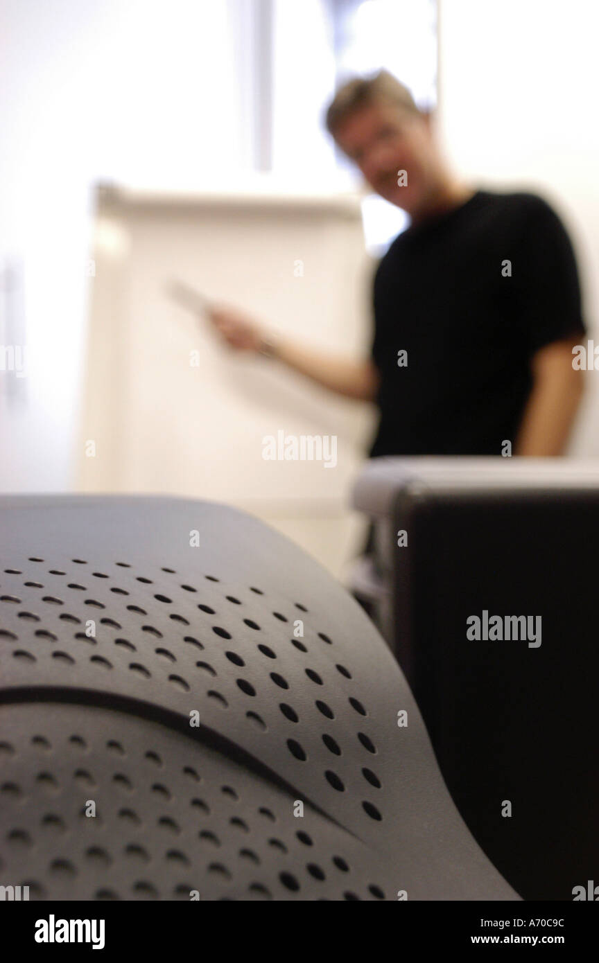 Instructor seen over monitor Stock Photo - Alamy