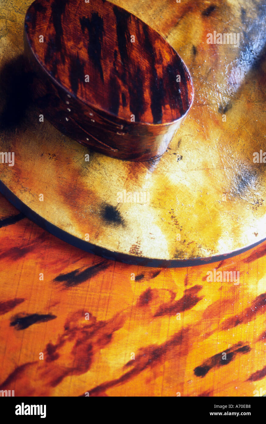 Faux tortoiseshell paint effects demonstrated on boxes and surfaces ...