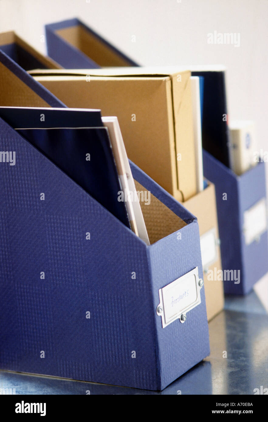 Box files with papers in modern context Stock Photo - Alamy