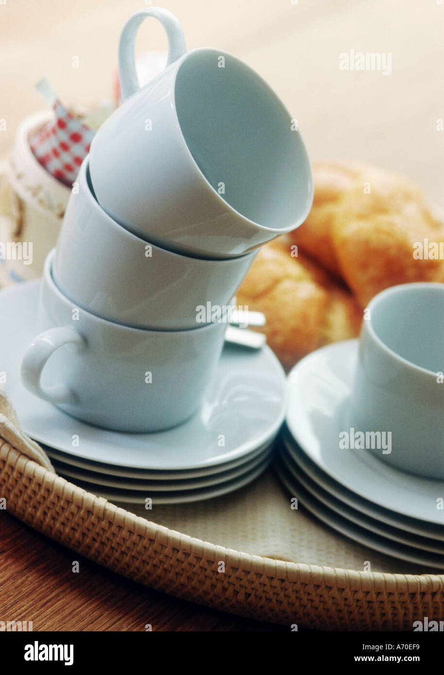 Stacked cups with croissants ready for breakfast Stock Photo - Alamy