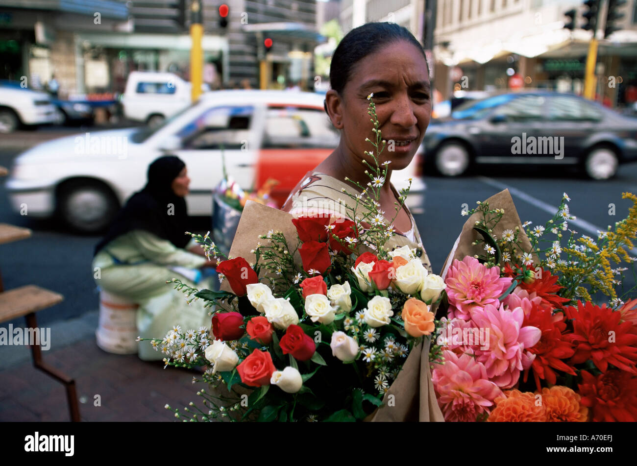 Woman selling flowers at the flower market on Adderley Street Cape Town ...