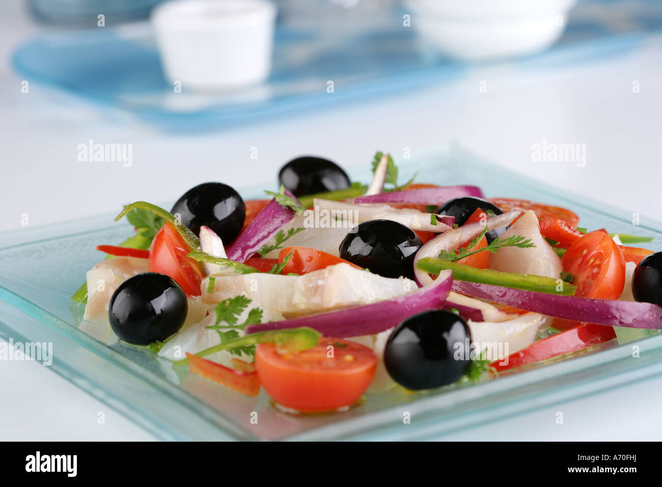 Shredded salt cod salad with manzanilla olives Stock Photo - Alamy