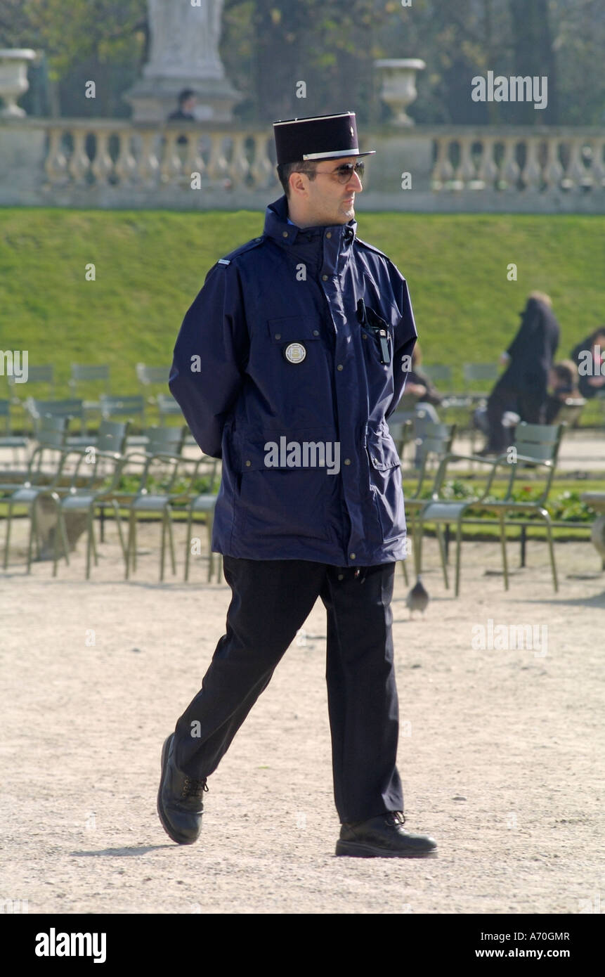 French Policeman takes a stroll in the gardens of the Palais du ...
