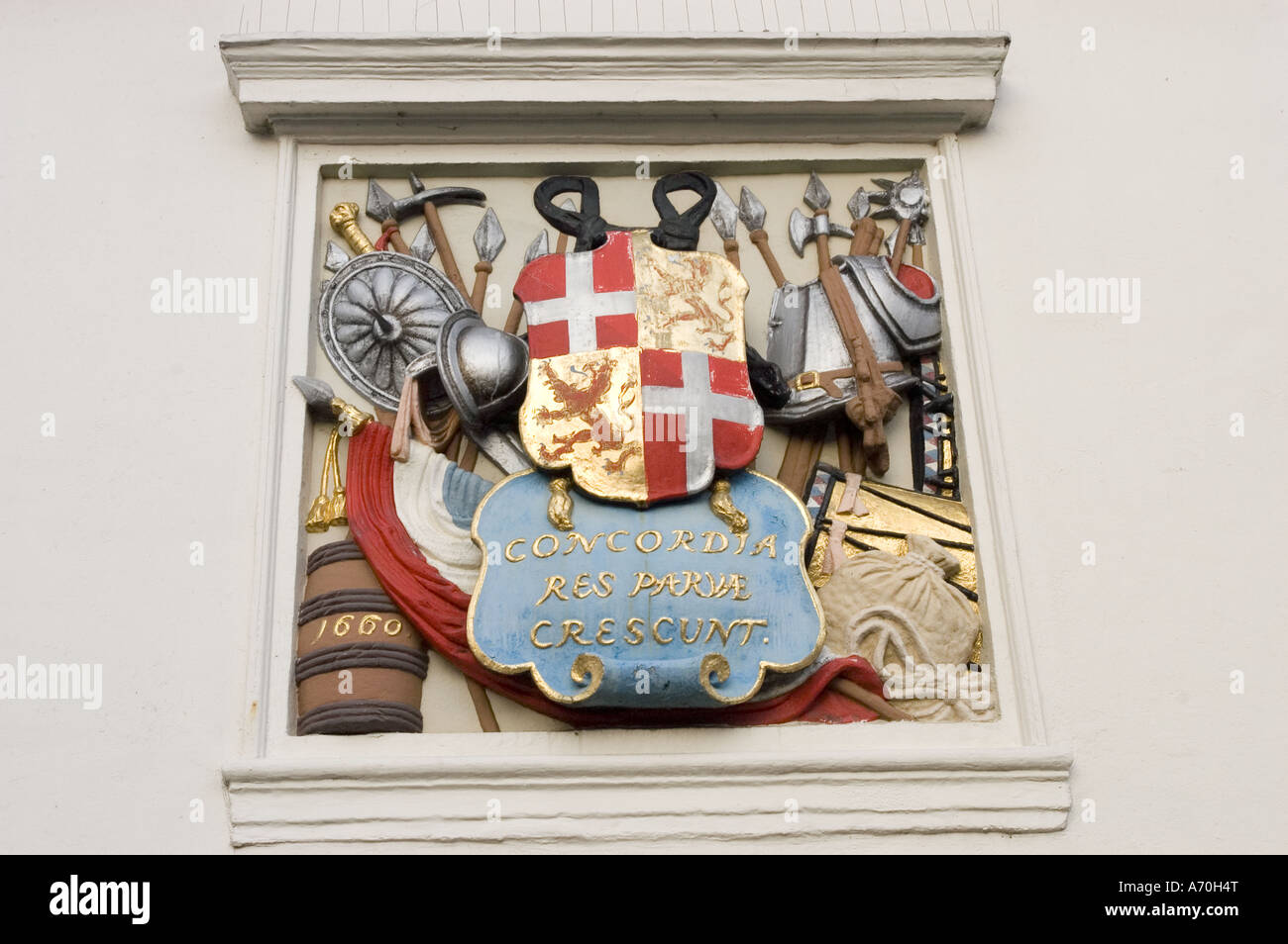 Coat of arms on white building of Utrecht University Department of Law ...