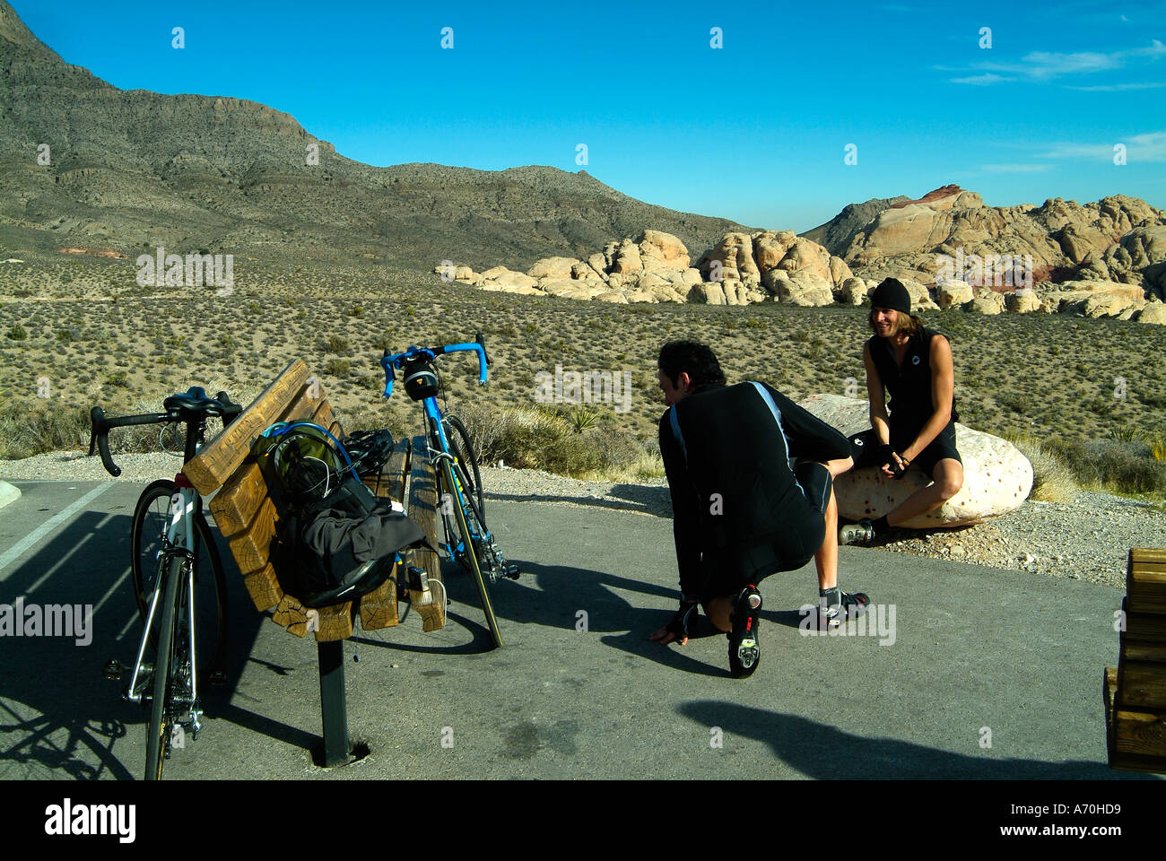 Cyclists resting on bench hi-res stock photography and images - Alamy