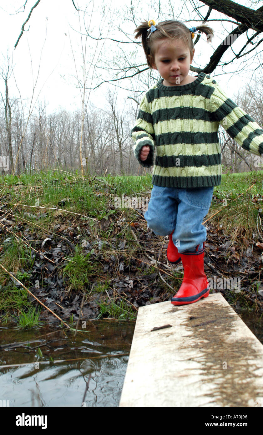 child crossing bridge Stock Photo - Alamy