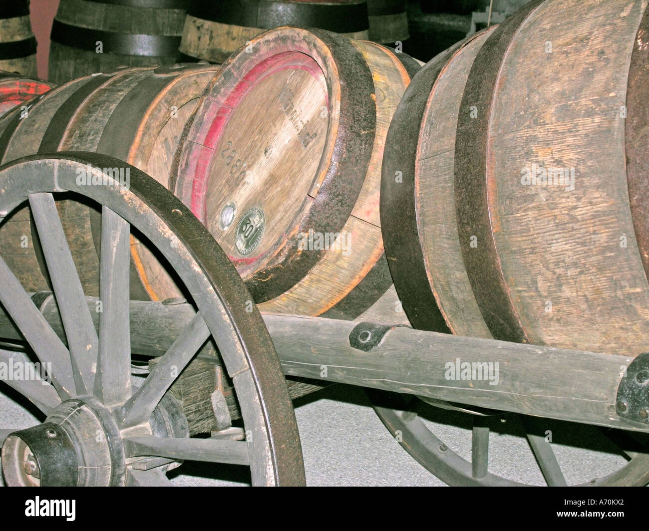 old wooden barrels on a wooden barrow in Bavarian beer museum in ...