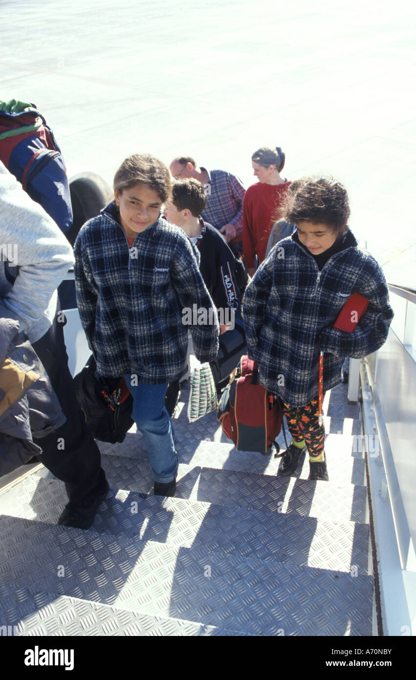 children boarding an aeroplane Stock Photo - Alamy