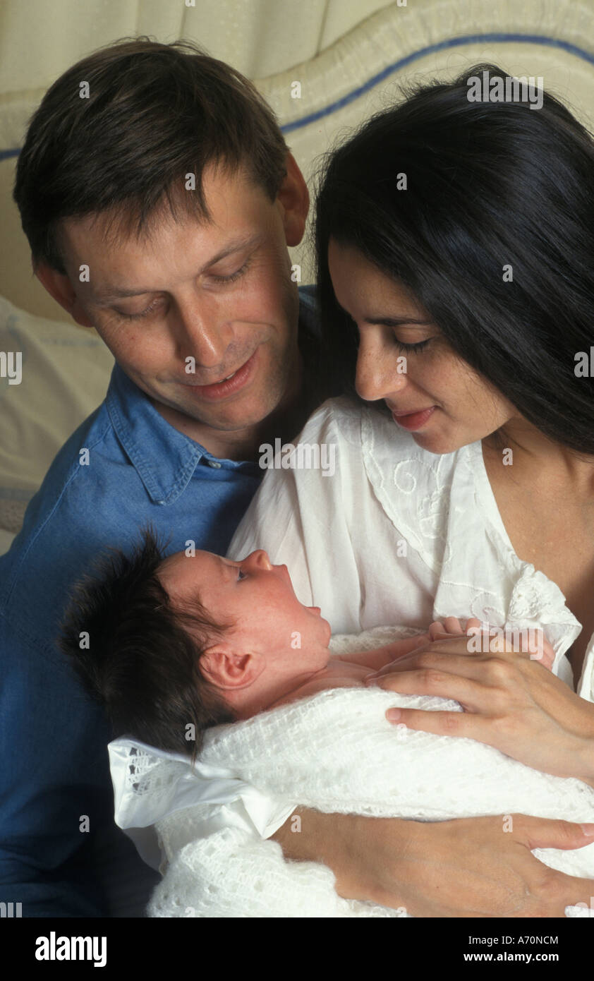 couple with newborn baby Stock Photo - Alamy
