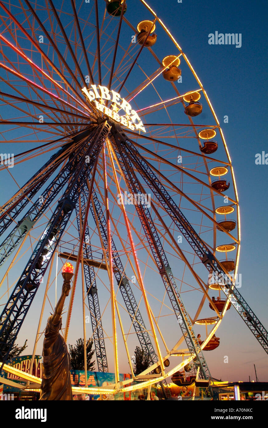 Parish fair in the evening in Ribnitz at the Saaler Bodden. Roundabouts ...