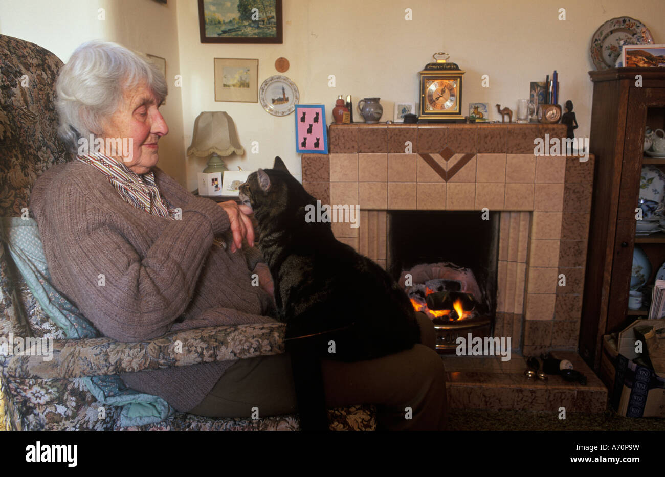 Cold old lady fire hi-res stock photography and images - Alamy