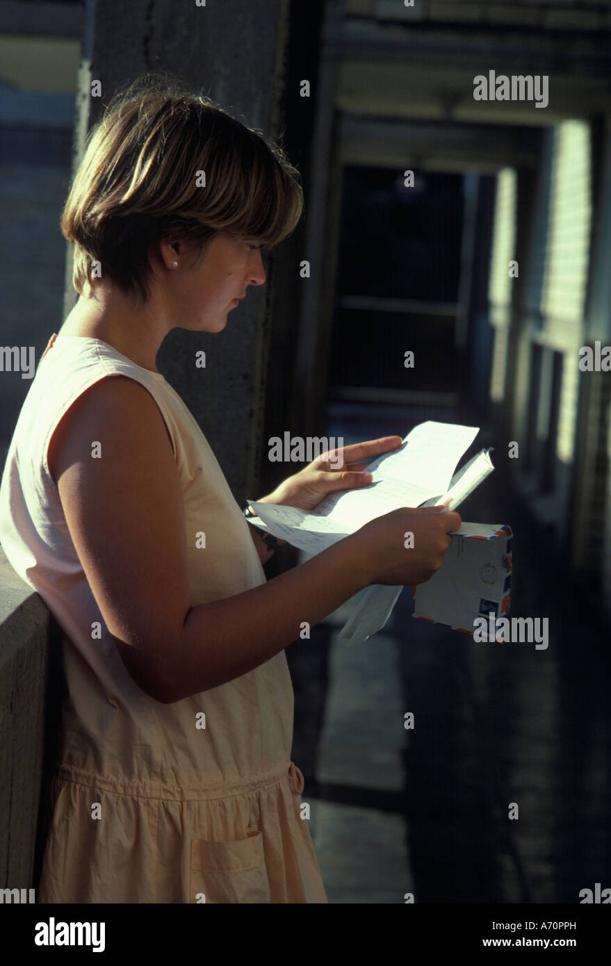 woman reading letter Stock Photo - Alamy