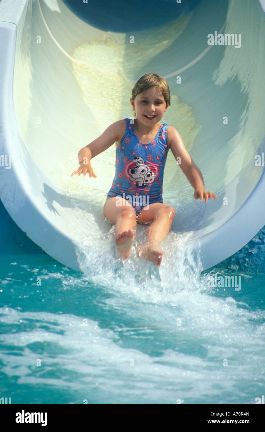 Girl going down a slide hi-res stock photography and images - Alamy