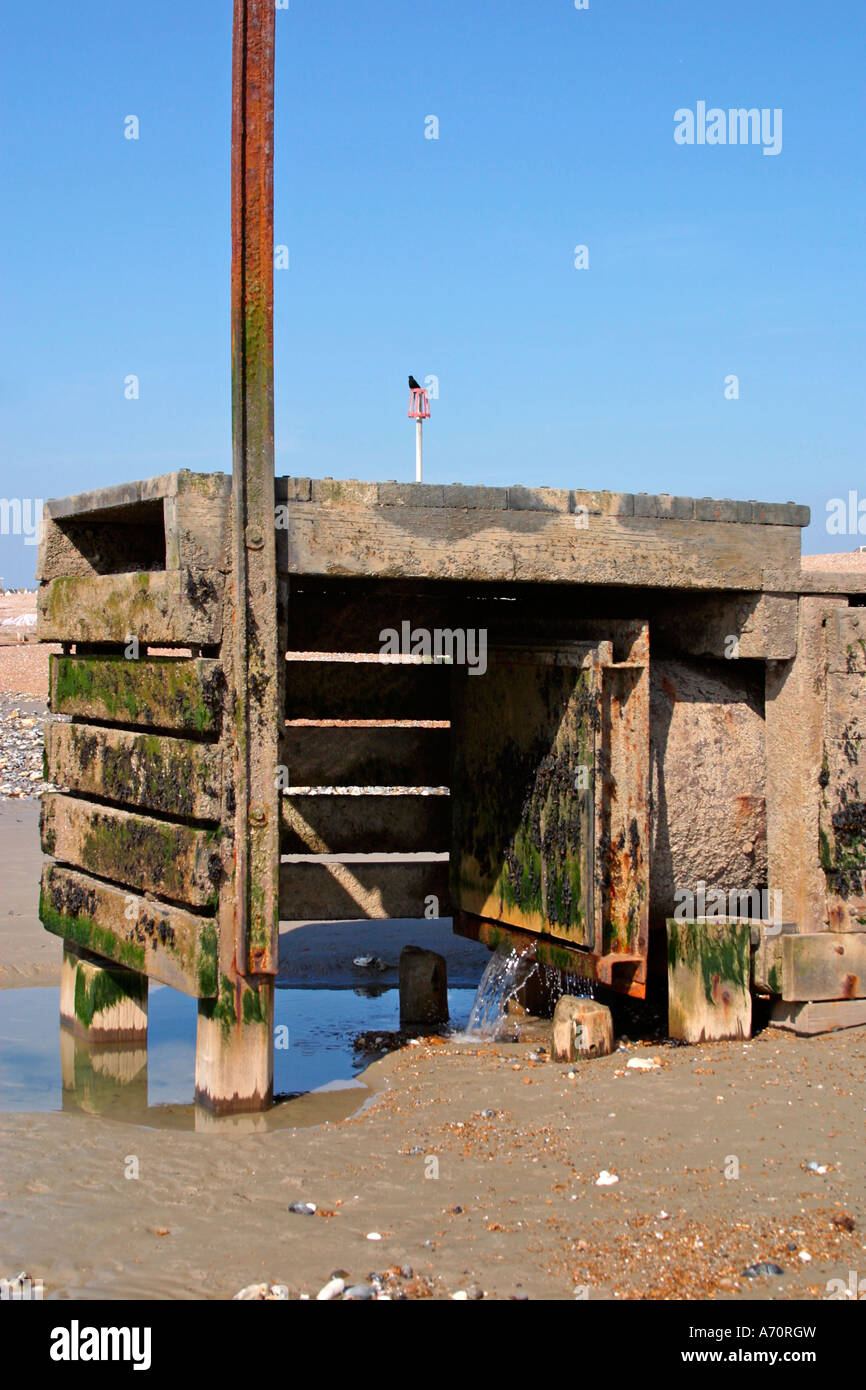 Sewage pipe outlet on Sussex beach at low tide Stock Photo - Alamy