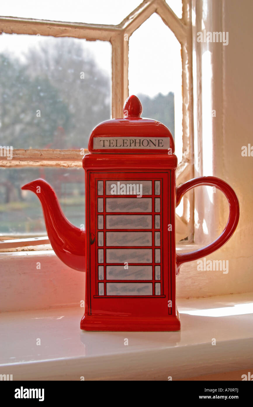 Novelty teapot in shape of British red telephone box sitting on ...