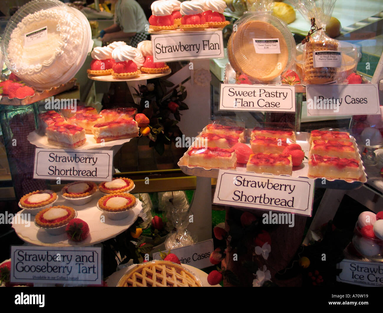 Summer Cakes in shop window Stock Photo - Alamy