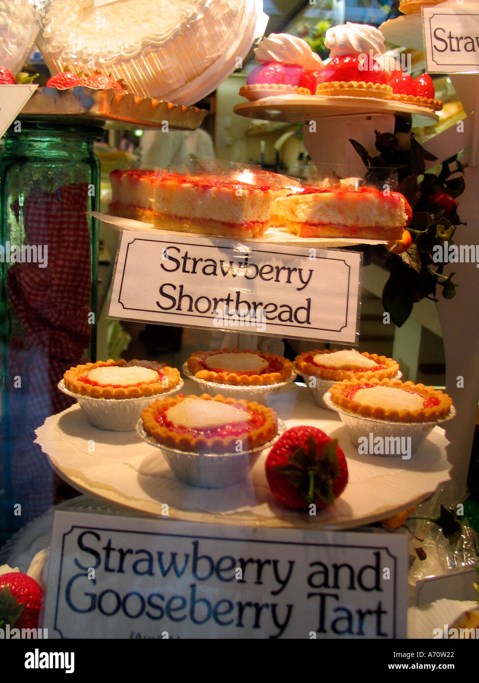 Summer cakes in shop window Stock Photo - Alamy