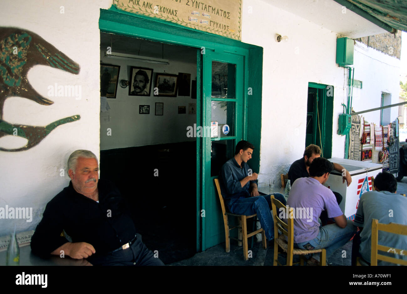 greece crete old men outside a cafeneion Stock Photo - Alamy