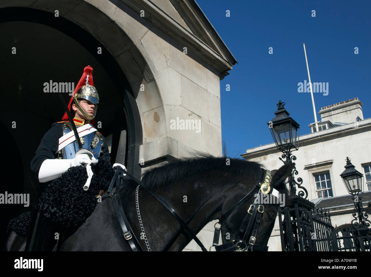 A young soldier of the House Guards sitting on his horse in his ...
